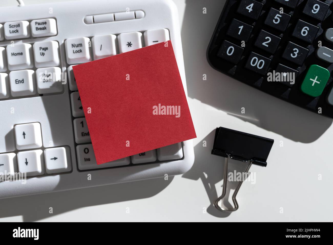 Important Messages Written On Note On Desk With Calculator, Paperclip ...