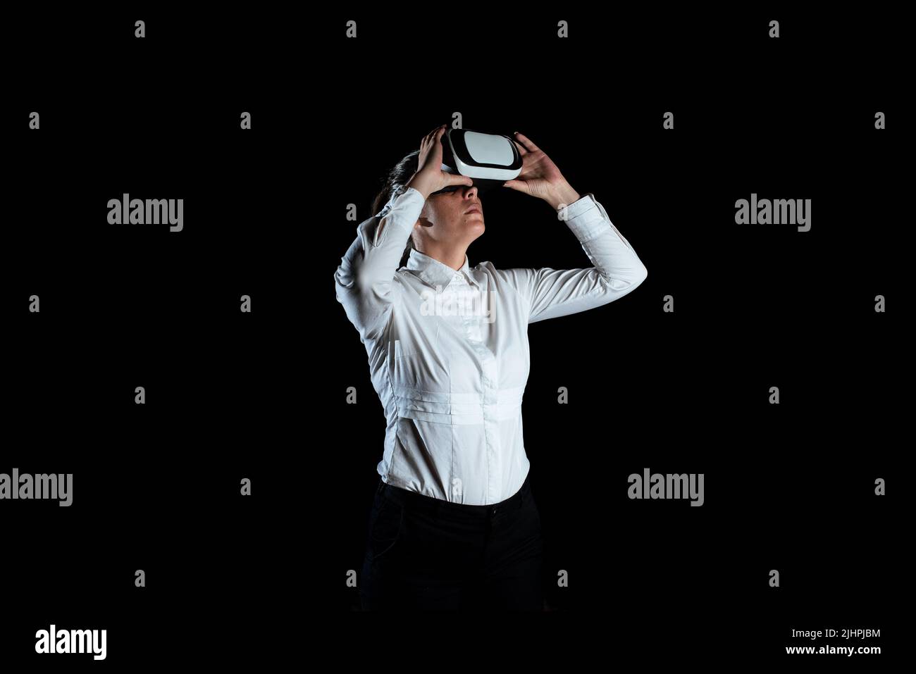Female Professional Wearing Virtual Reality Goggles And Enjoying ...