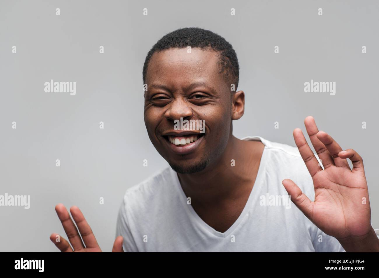 Smiling black guy full of happiness and positive Stock Photo - Alamy Smiling black guy full of happiness and positive Stock Photo - Alamy