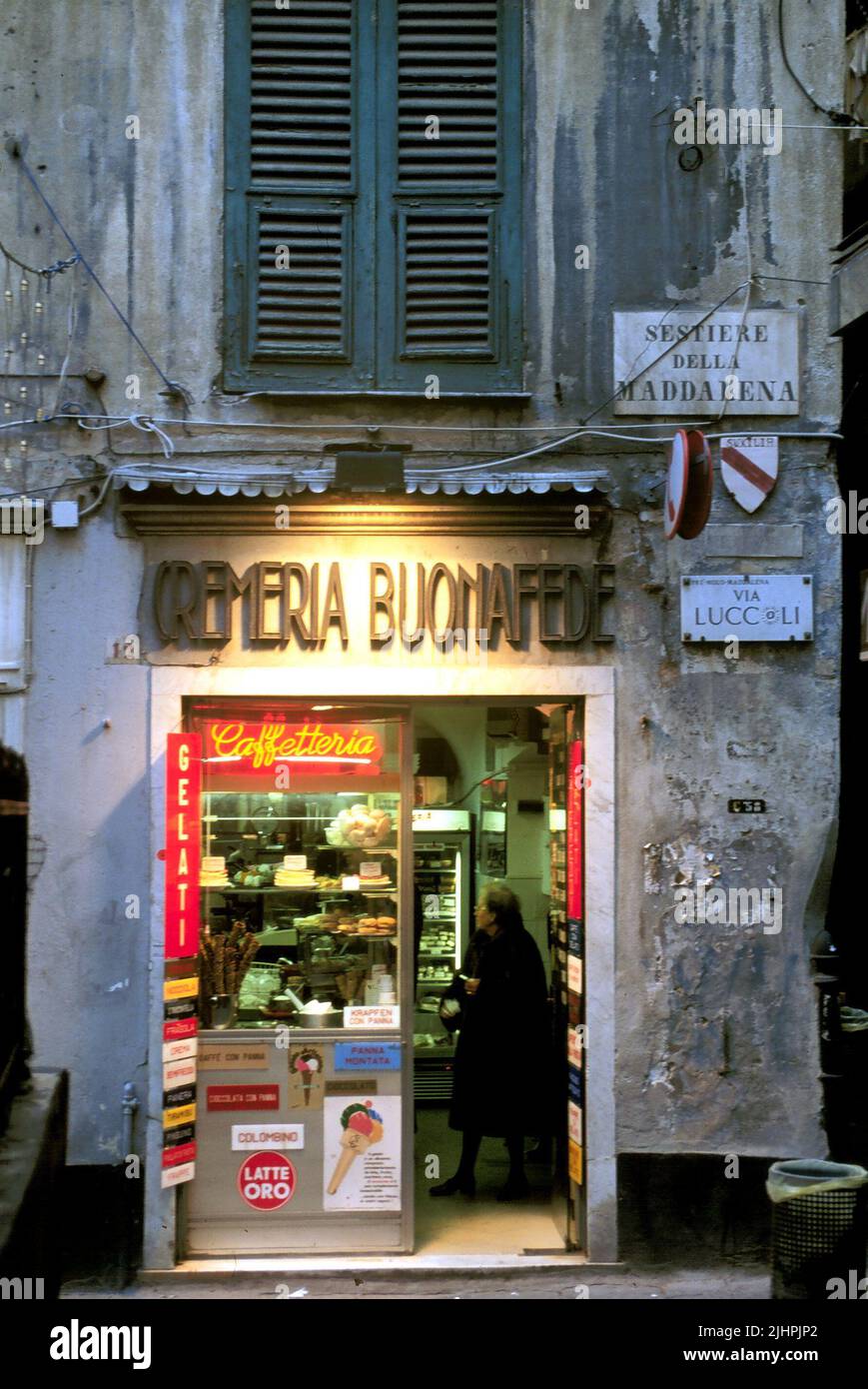 Genoa (Italy), outside of a typical cafe in a narrow alley of the ...