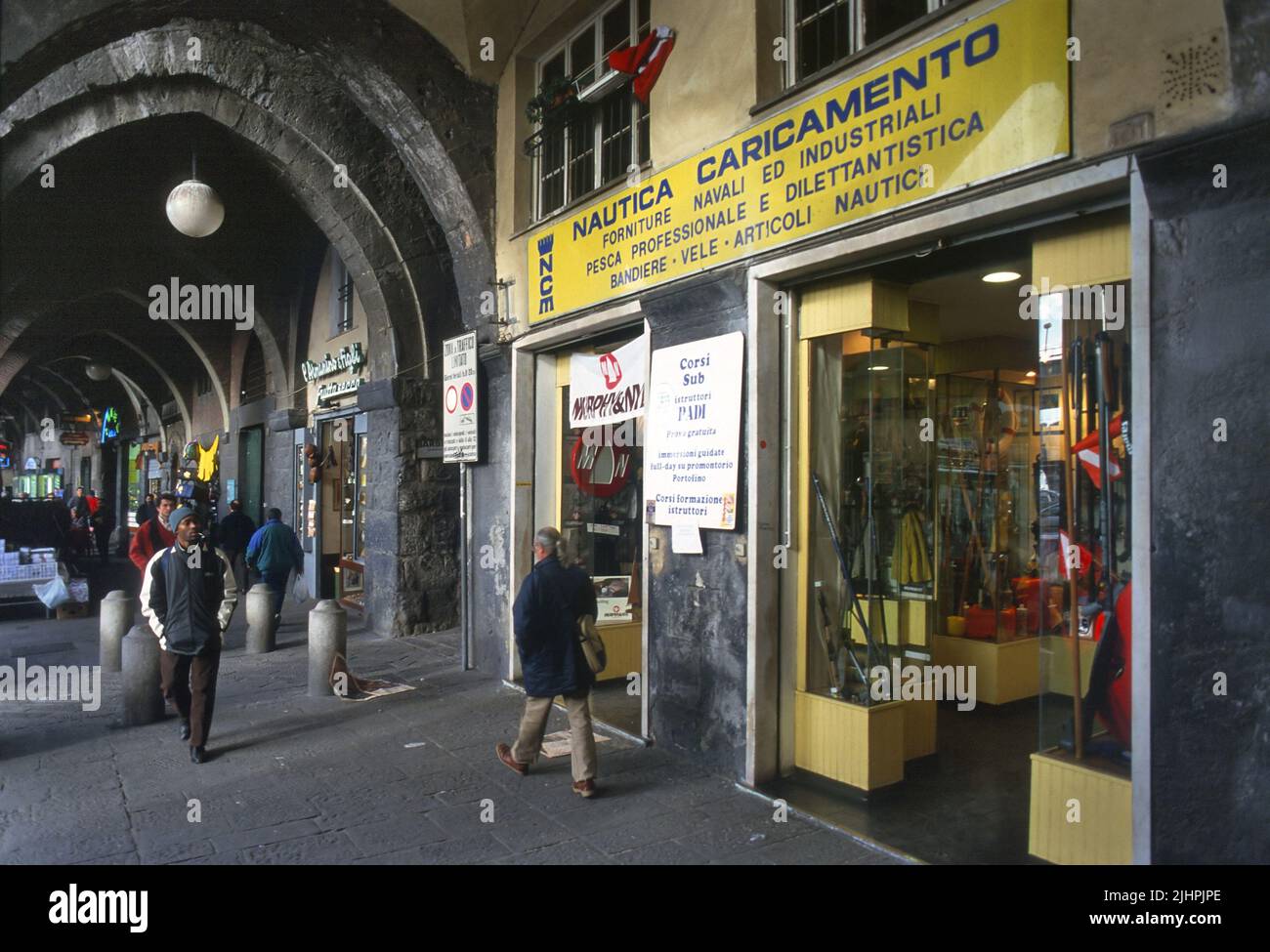 Genoa (Italy), naval supplies store in Sottoripa Porticos Stock Photo ...