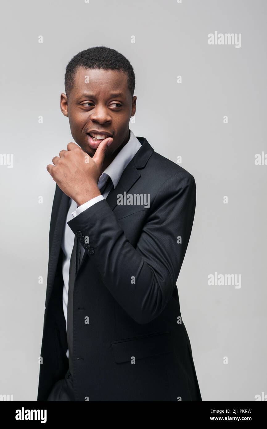 Afroamerican man feels temptation and addiction Stock Photo - Alamy