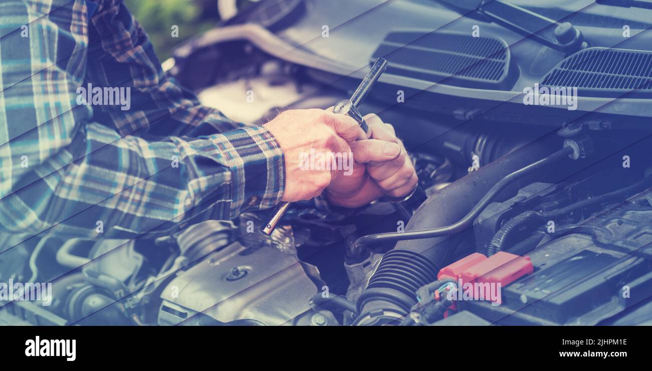 Car mechanic repairing a car engine, geometric pattern Stock Photo - Alamy