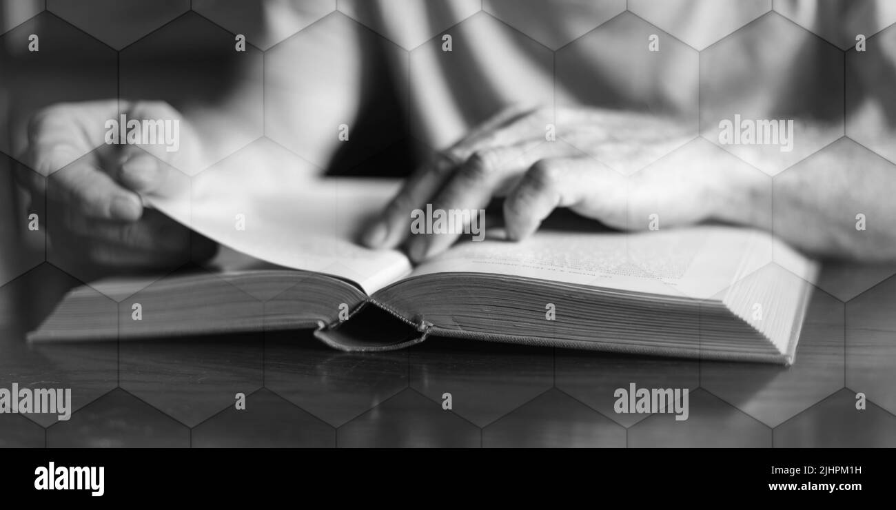 Man sitting table book Black and White Stock Photos & Images - Alamy