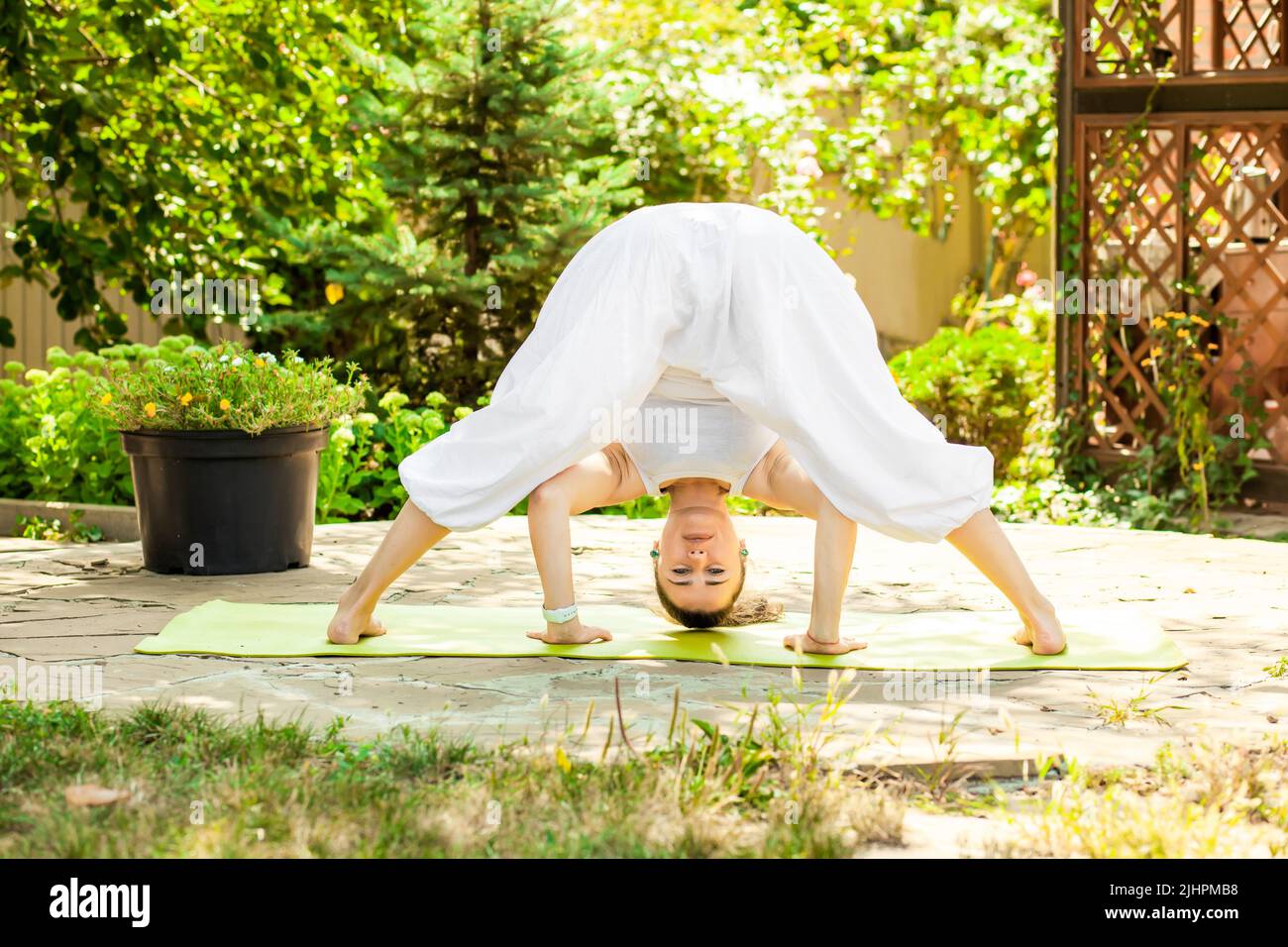 Wide stance forward bend pose yoga hi-res stock photography and images ...