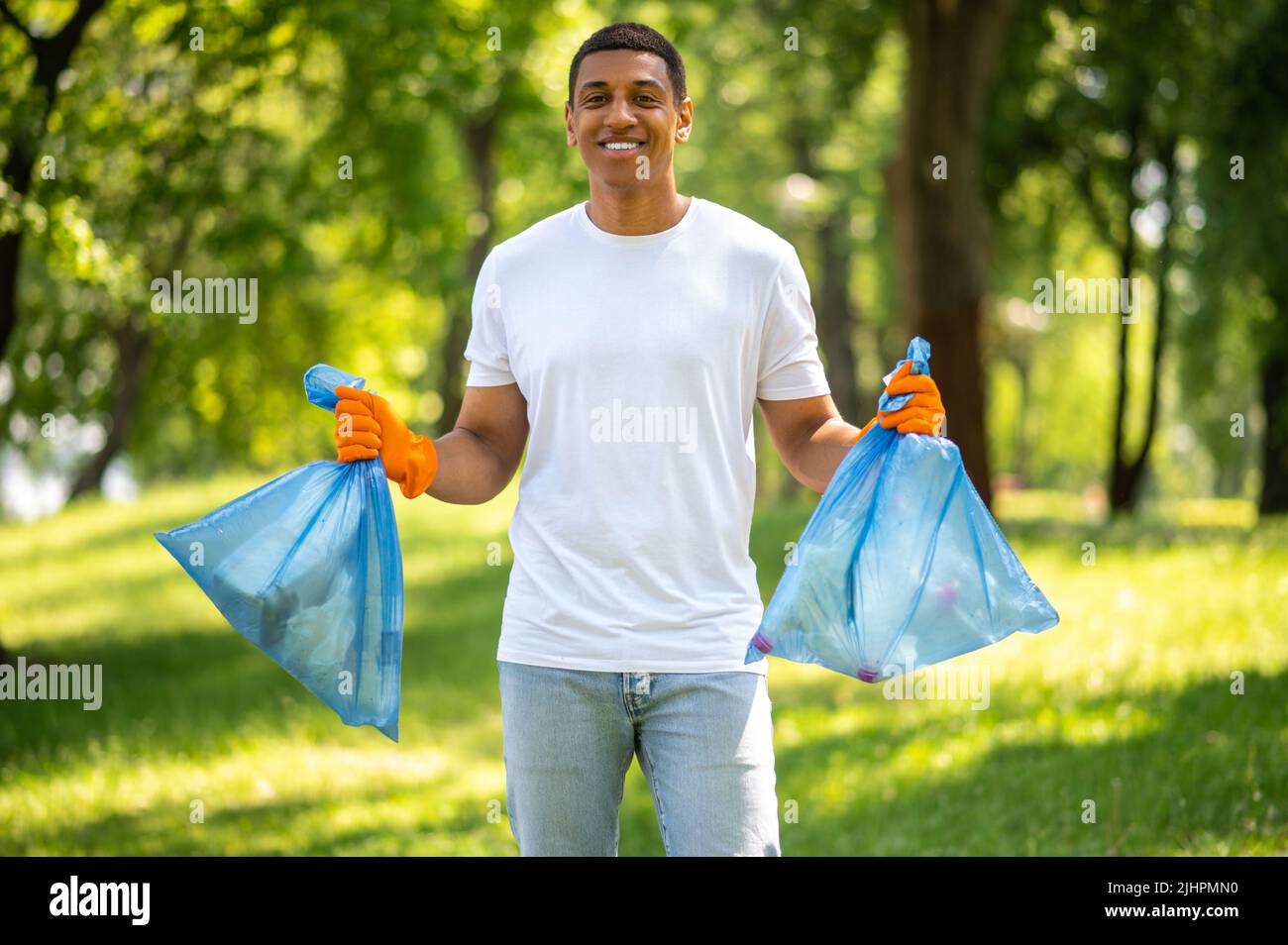 Trash bags and gloves hi-res stock photography and images - Alamy
