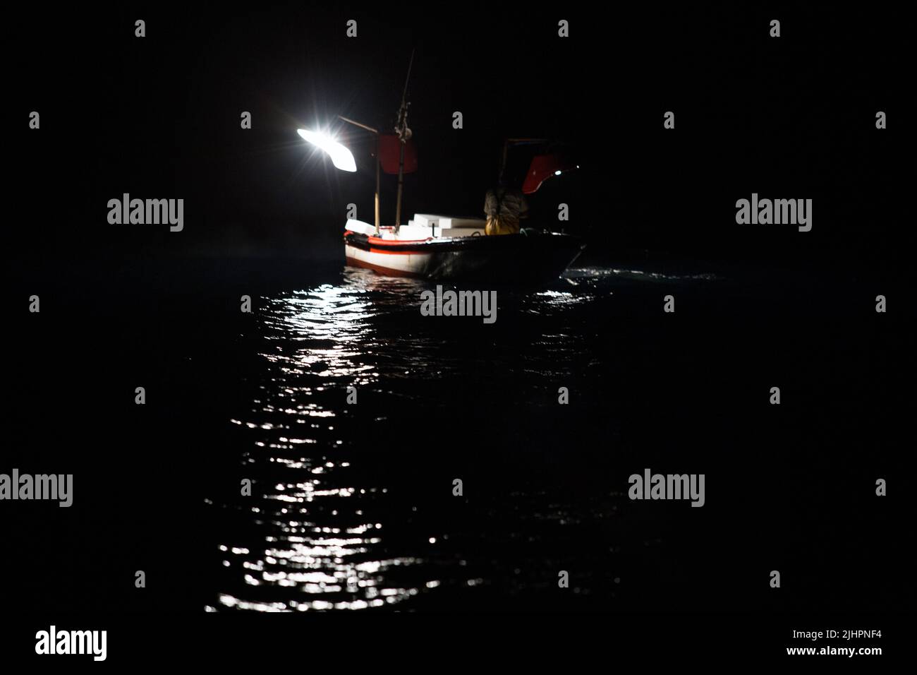 Purse seine fishing light boat on work Stock Photo - Alamy