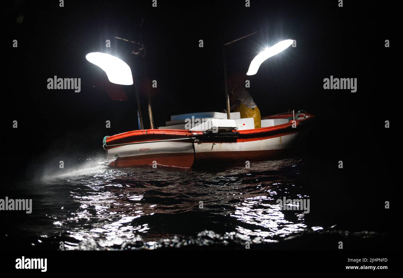 Purse seine fishing light boat on work Stock Photo - Alamy
