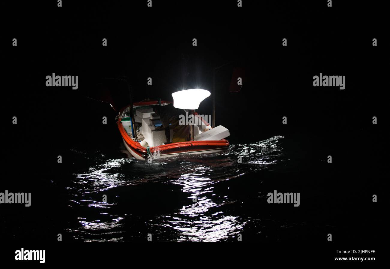 Purse seine fishing light boat on work Stock Photo - Alamy
