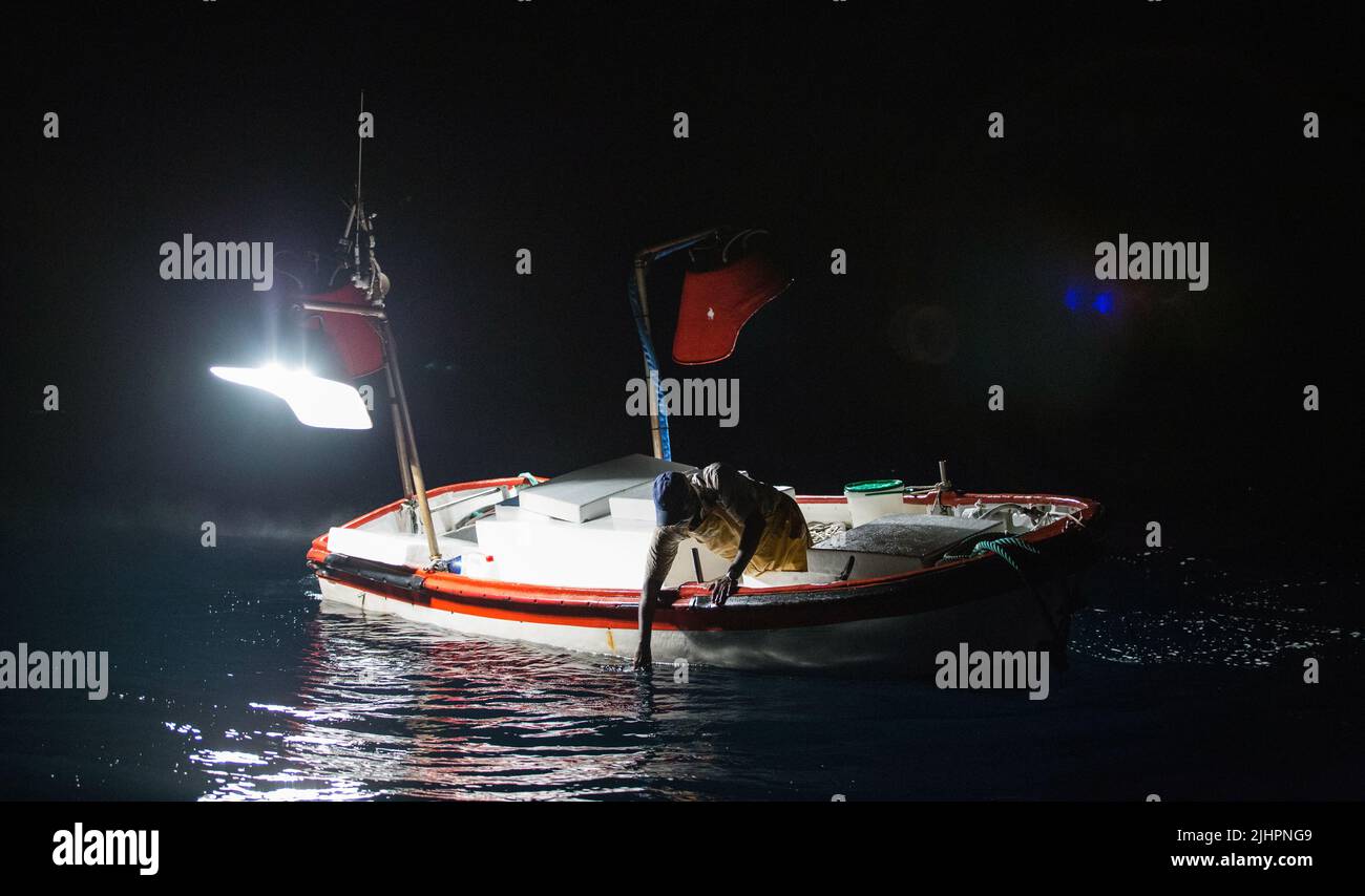 Purse seine fishing light boat on work Stock Photo - Alamy