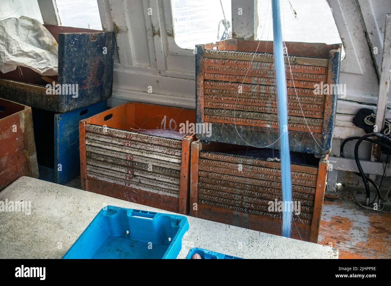 Longline hook boxes Stock Photo - Alamy