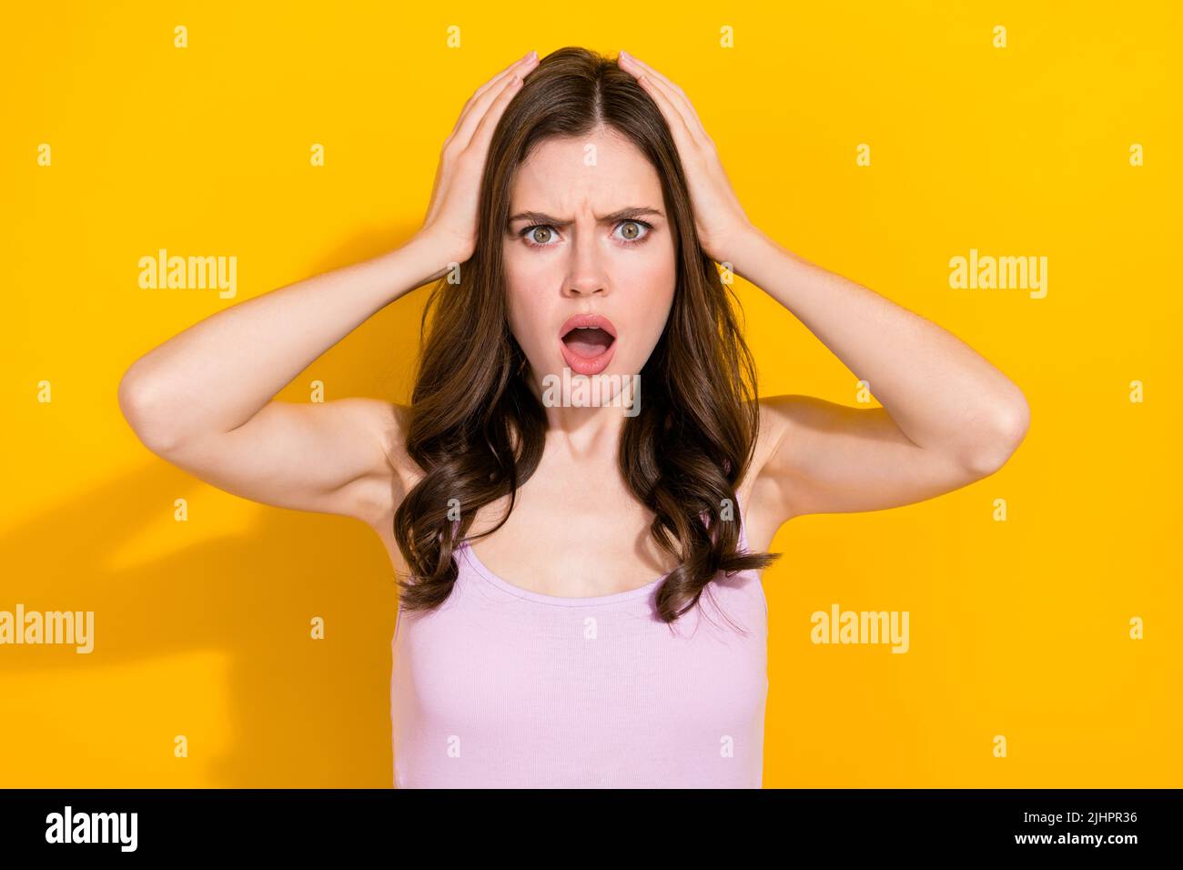 Portrait of impressed unsatisfied person arms head open mouth stare ...