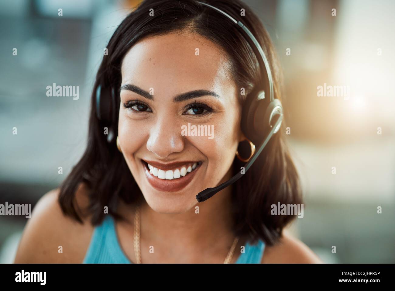 .. Stylish and elegant modern business woman working in an office or ...