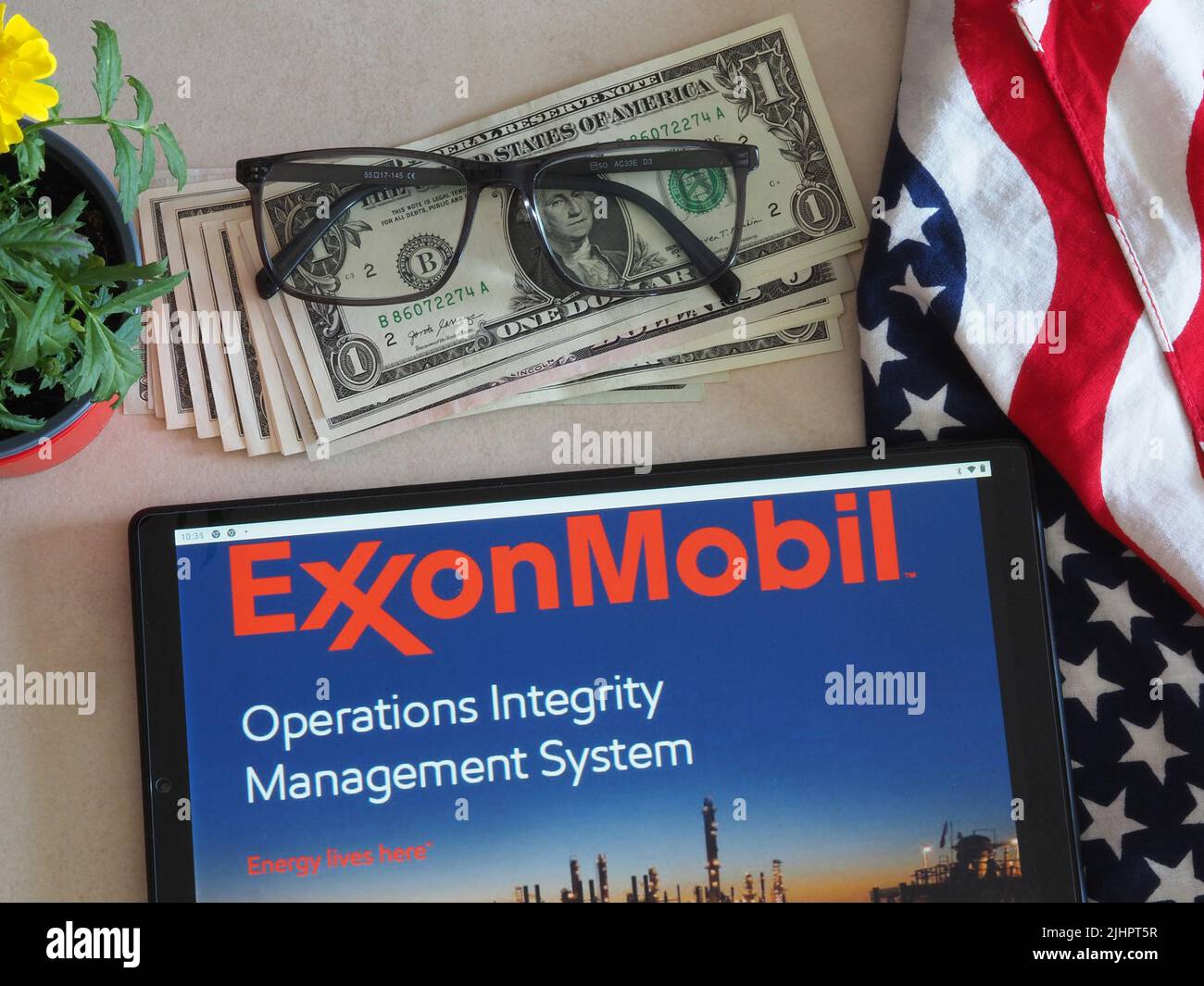 In this photo illustration, Exxon Mobil Corporation logo seen displayed ...
