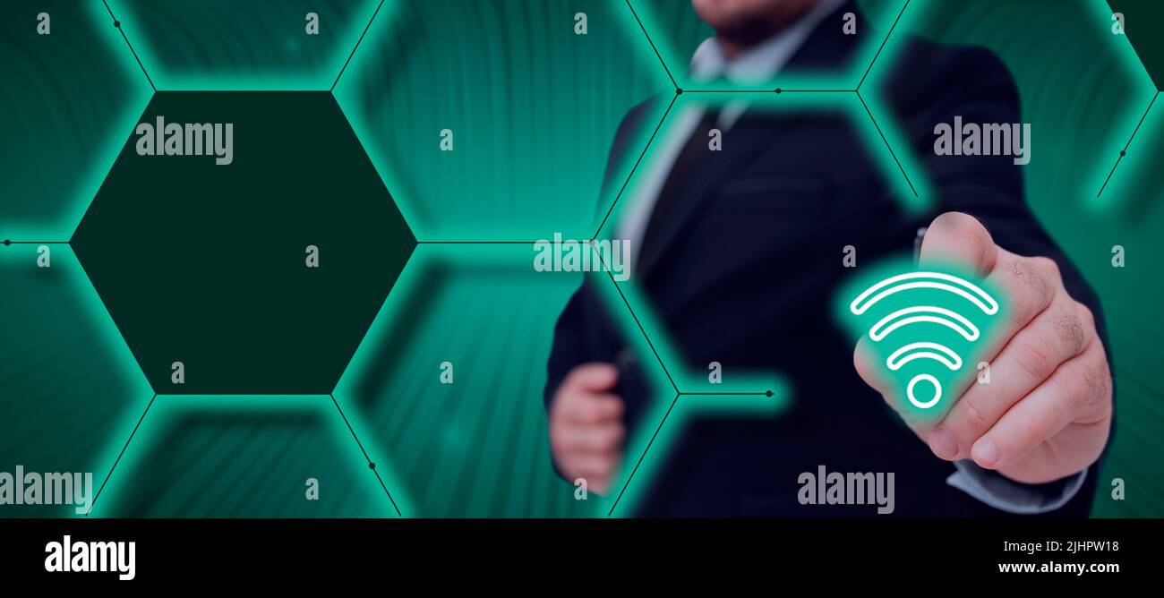 Businessman With A Pen Pointing On A Glowing Wi-Fi Signal In A Glowing ...