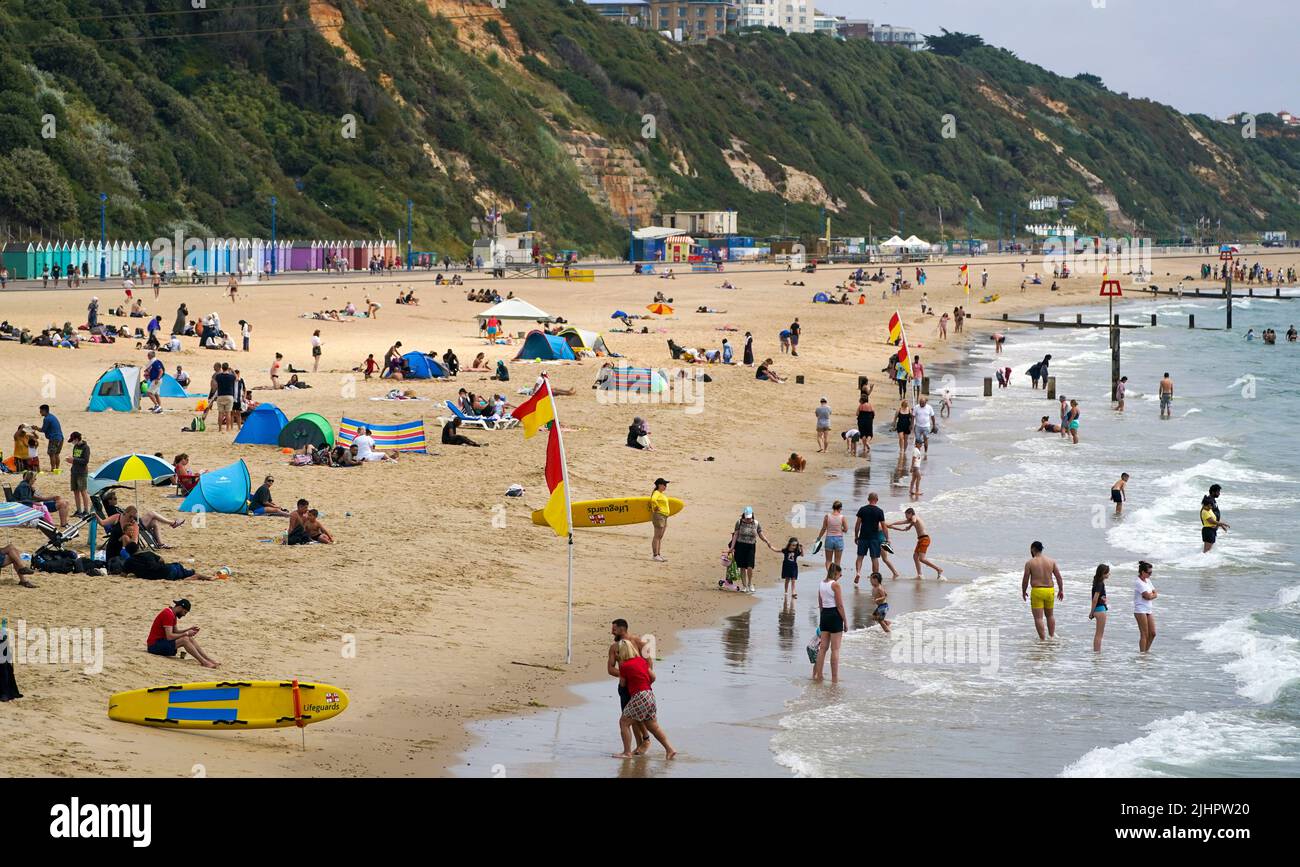 People enjoying the hot weather on Bournemouth beach after temperatures ...