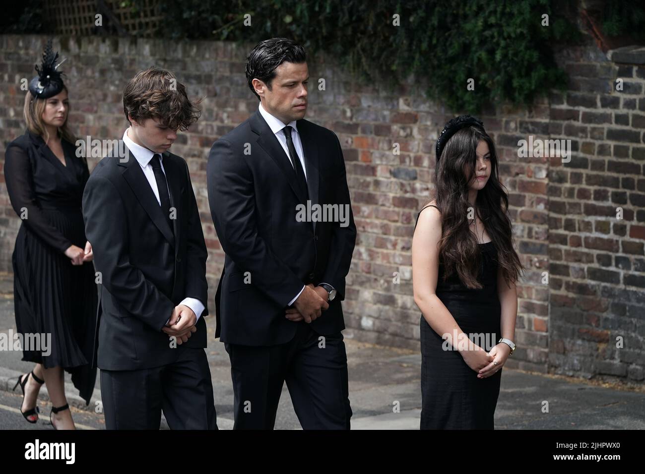 (left to right) Son Hugo, husband Sebastien Bowen, and daughter Eloise ...