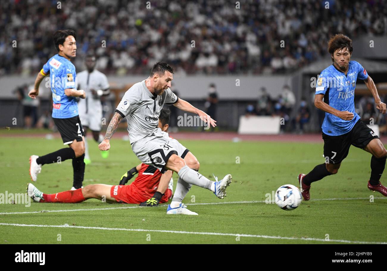 Paris Saint-Germain's Lionel Messi (C) shoots during the first half of ...