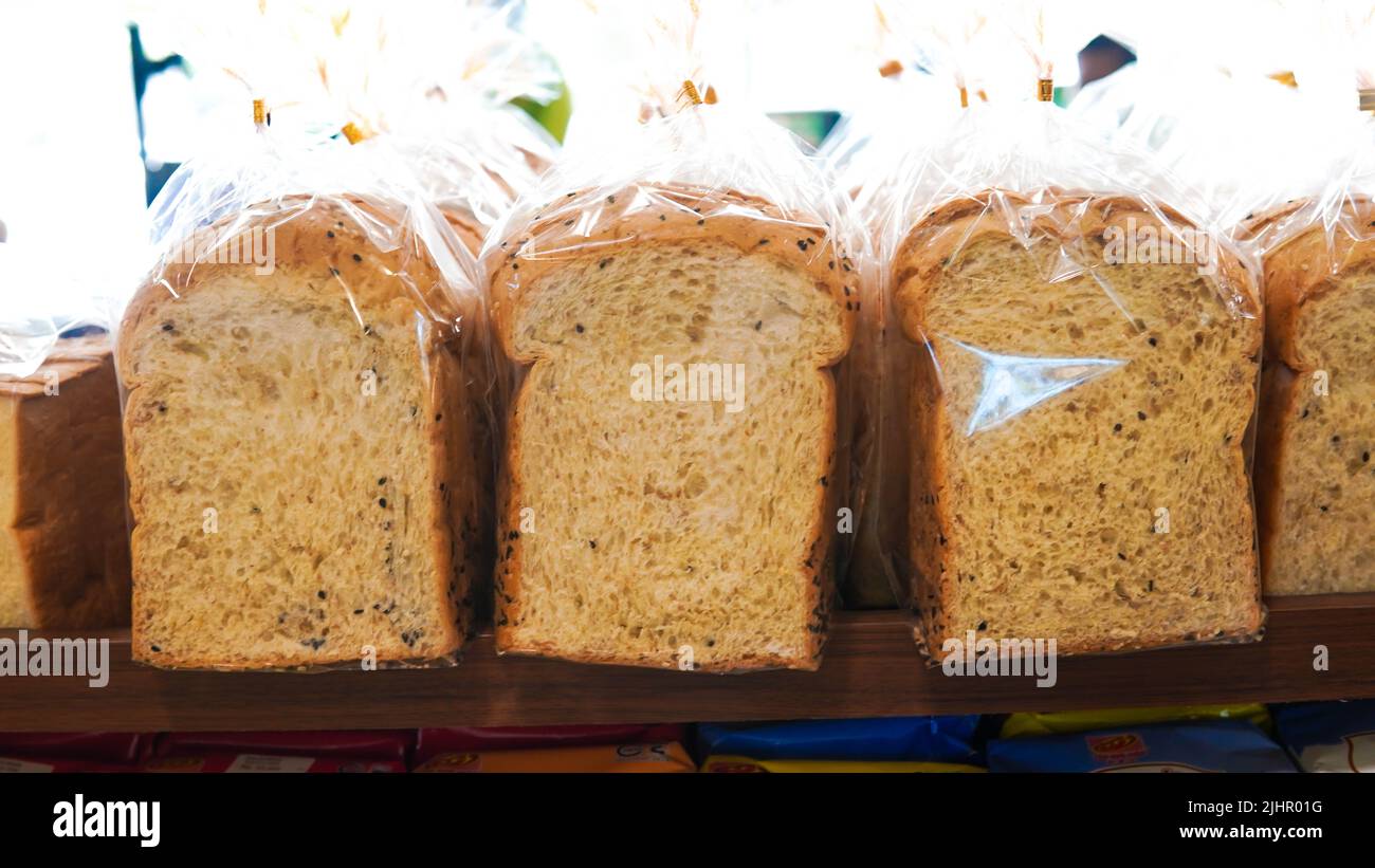 Fresh and hygiene bread at the store Stock Photo - Alamy