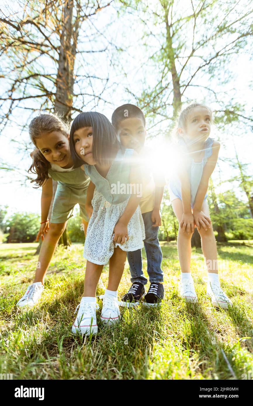 Group of cute asian and caucasian kids having fun in the park Stock ...
