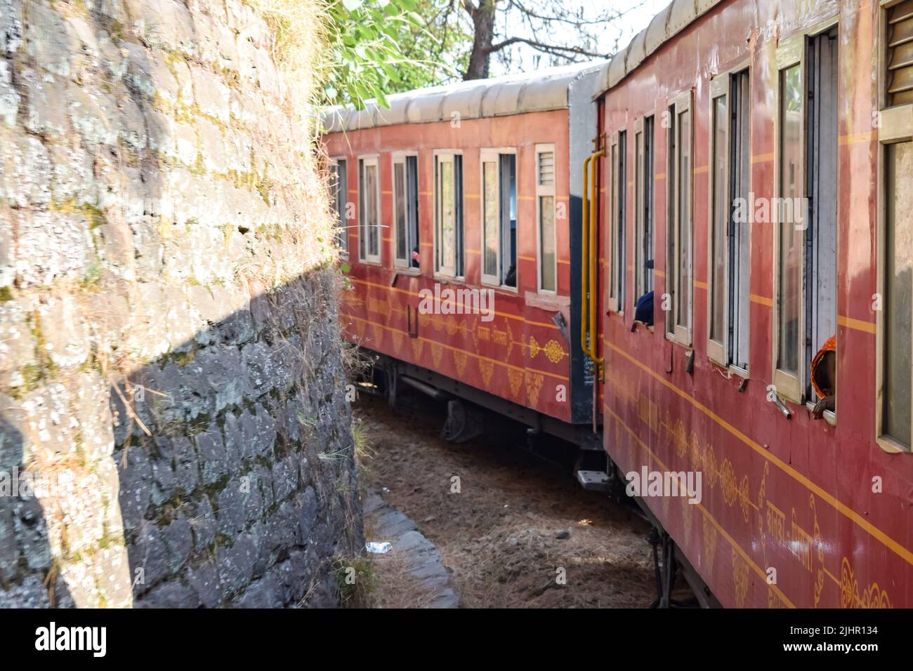 Toy Train moving on mountain slopes, beautiful view, one side mountain ...
