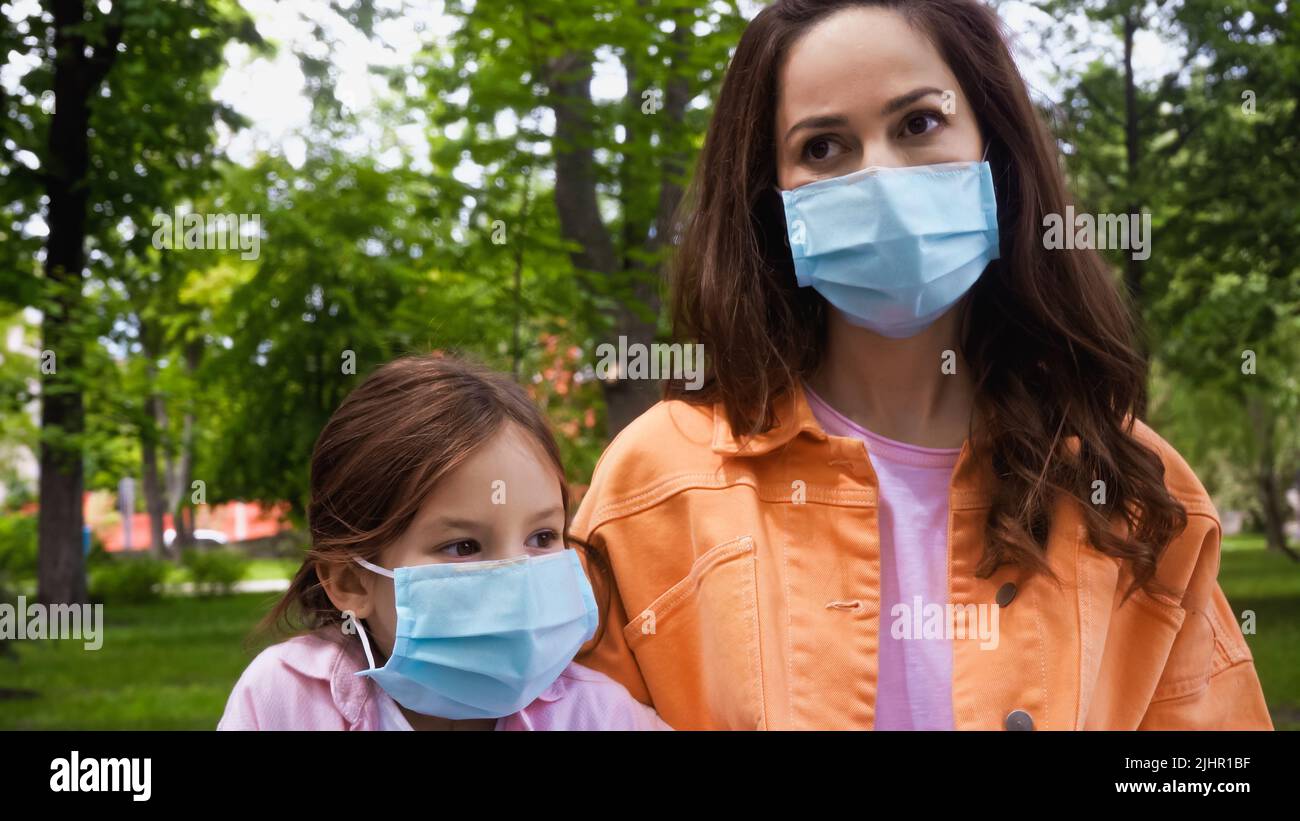Mother daughter in medical masks hi-res stock photography and images ...