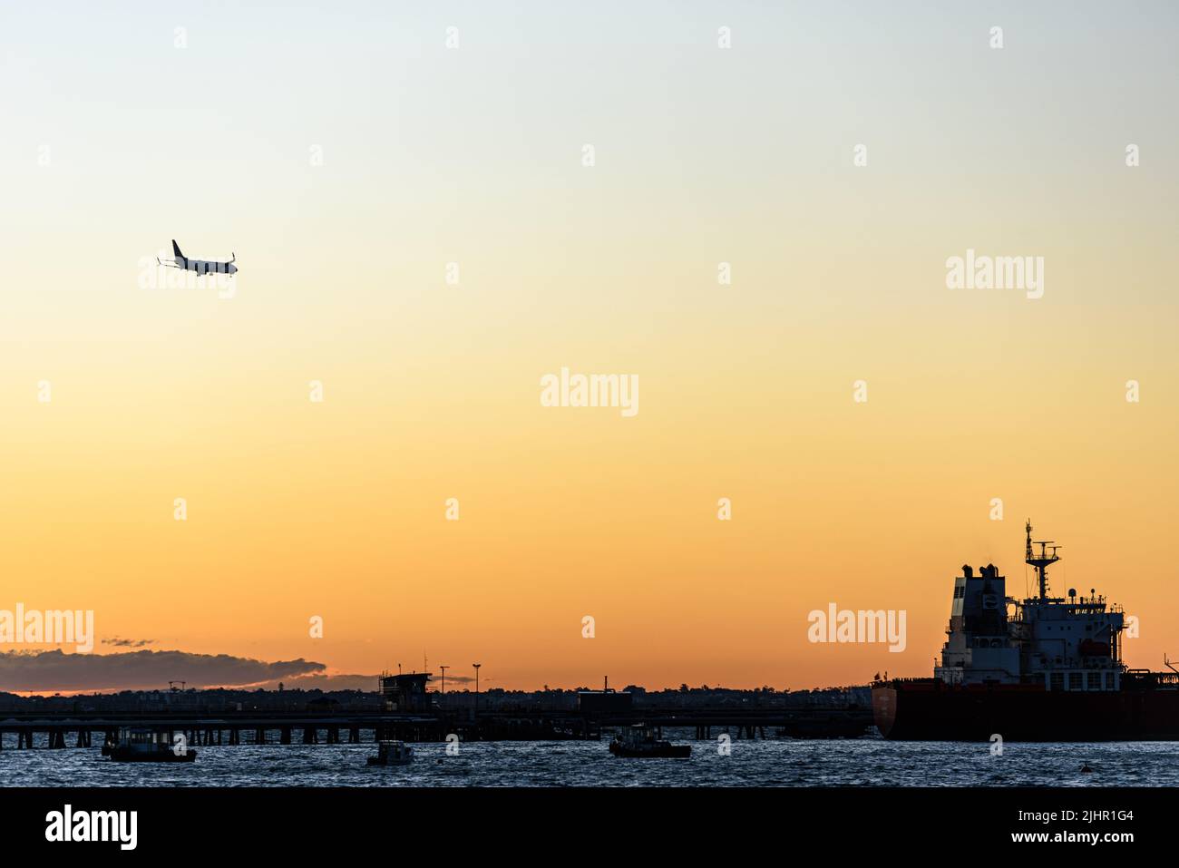 A Virgin Australia plane on its approach to Sydney Airport above Botany ...