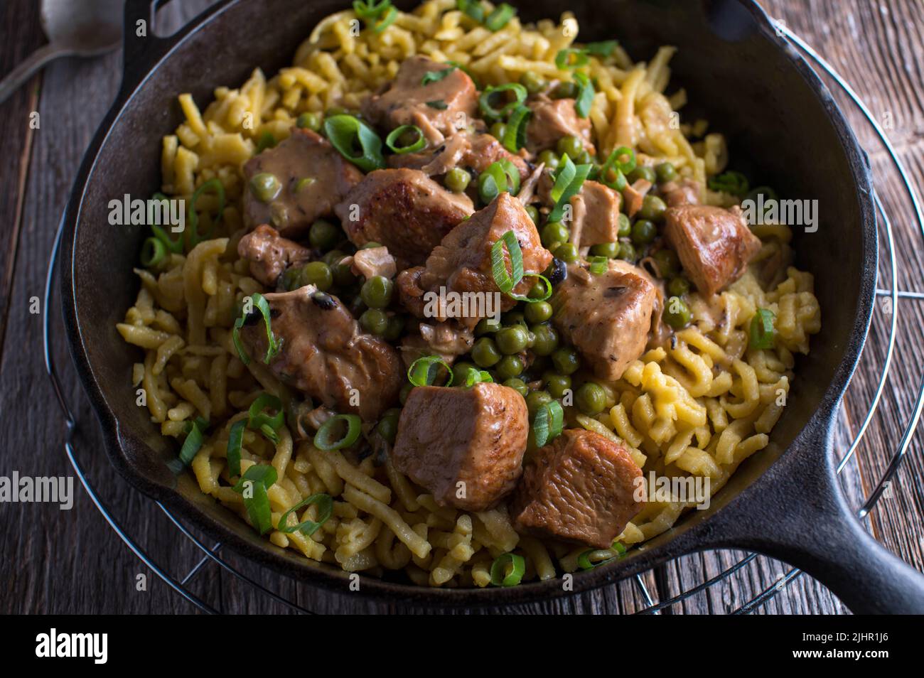 Rustic meat dish with pasta Stock Photo - Alamy
