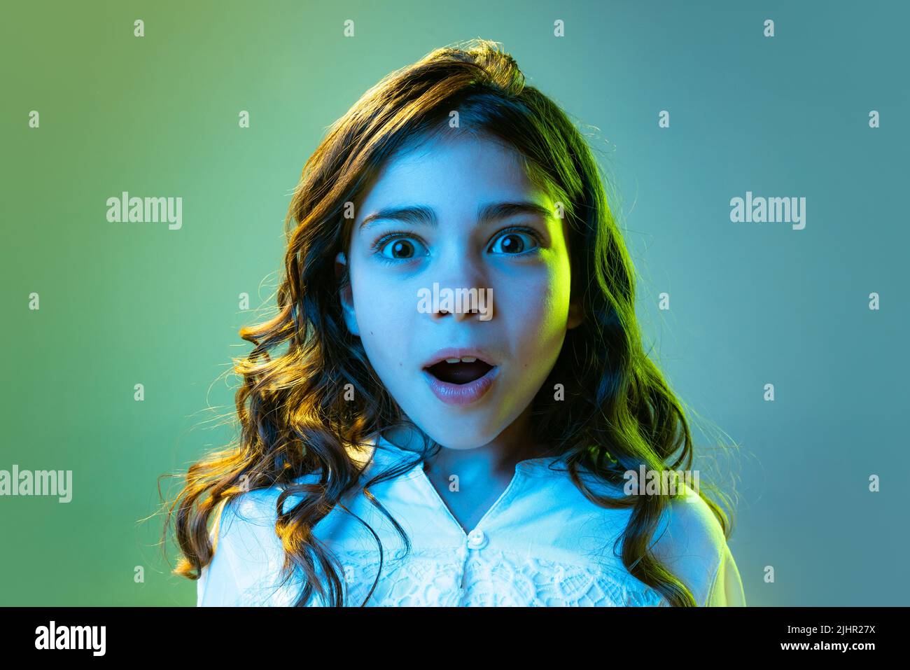 Closeup shocked little girl, kid in casual style clothes isolated over ...