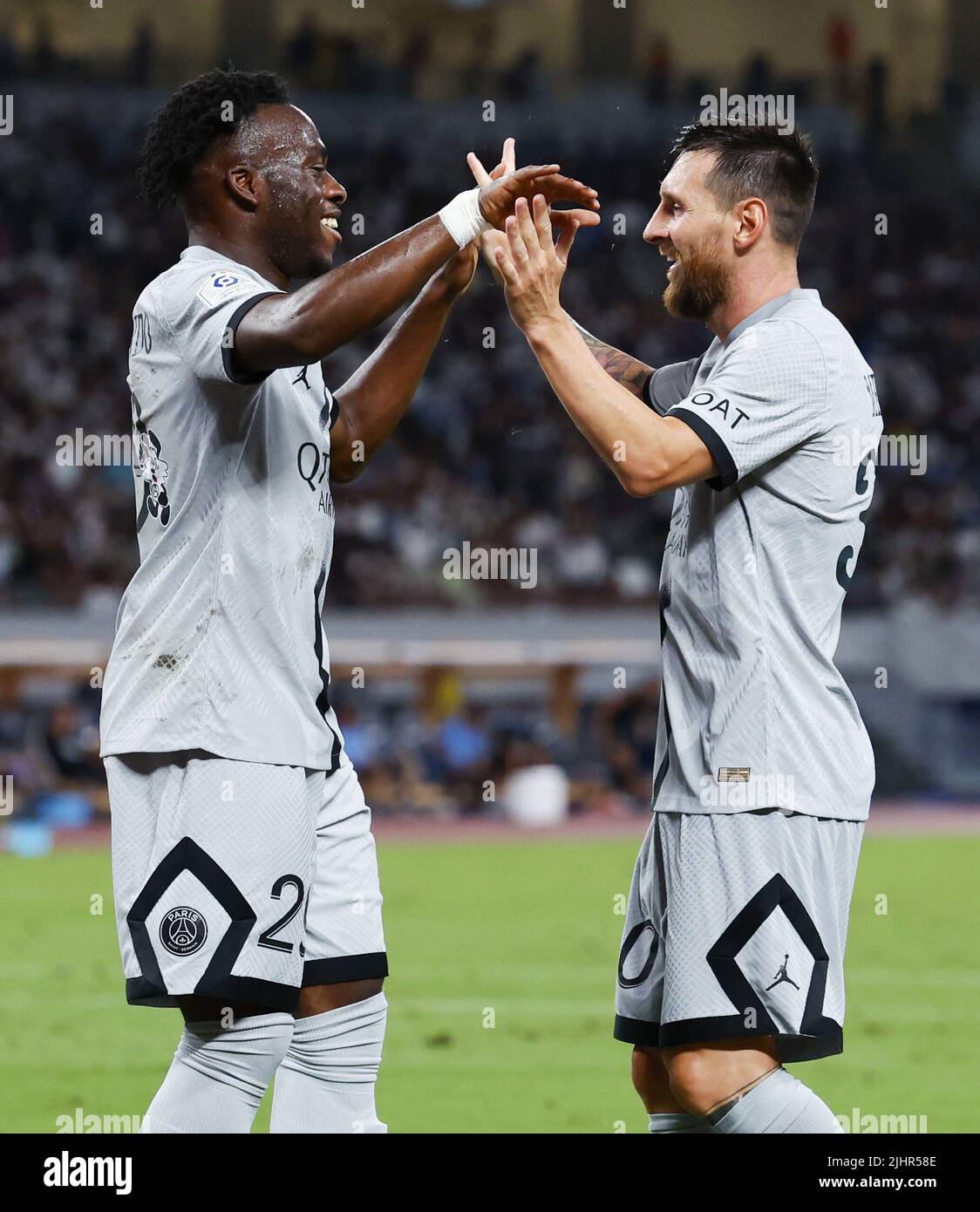 Arnaud Kalimuendo (L) celebrates with Lionel Messi after scoring Paris ...