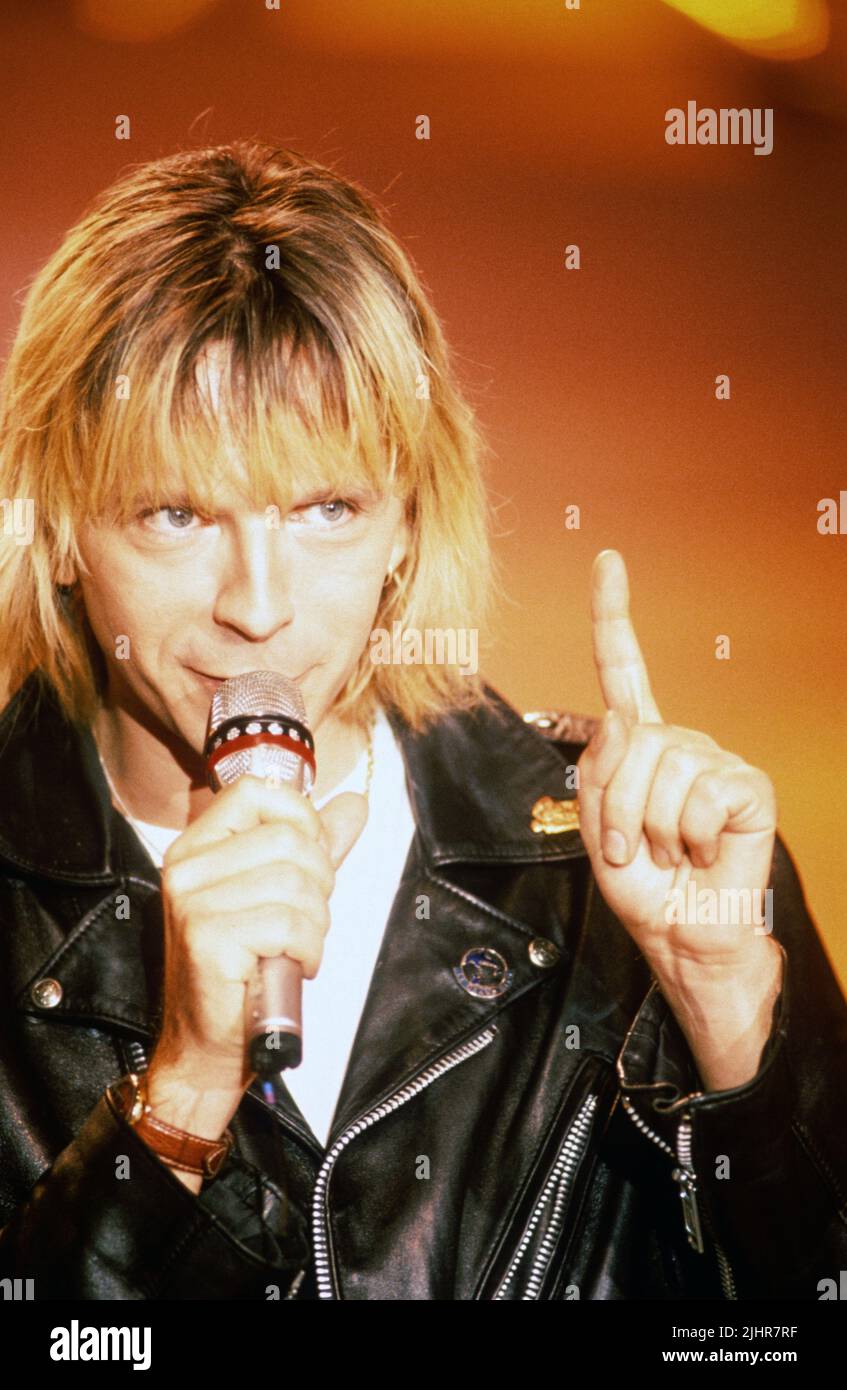 Renaud, French singer, on the set of the TV show "Champs Elysées" on ...