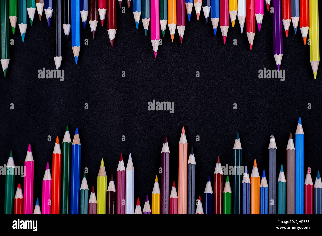 I'm going to school soon. A frame of multicolored simple pencils on a ...