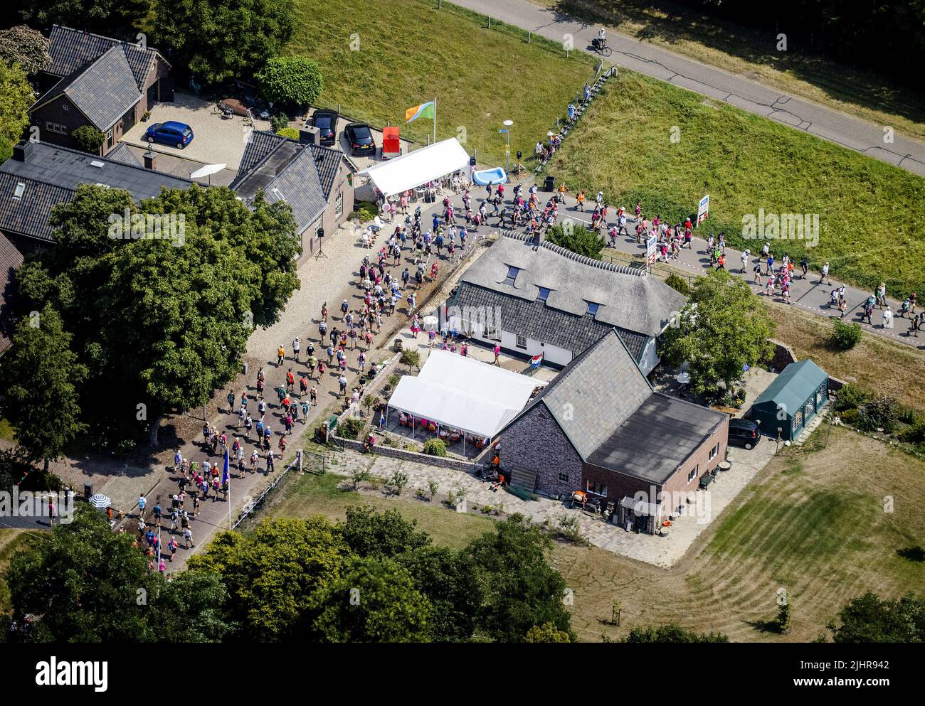 NIJMEGEN - Netherlands, 2022-07-20 13:51:15 NIJMEGEN - Hikers seen from ...