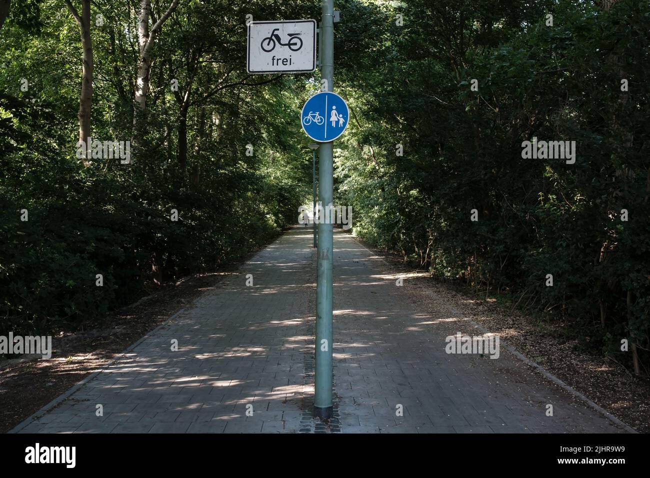 Sign separating a bicycle path from a pedestrian one, for safe movement ...