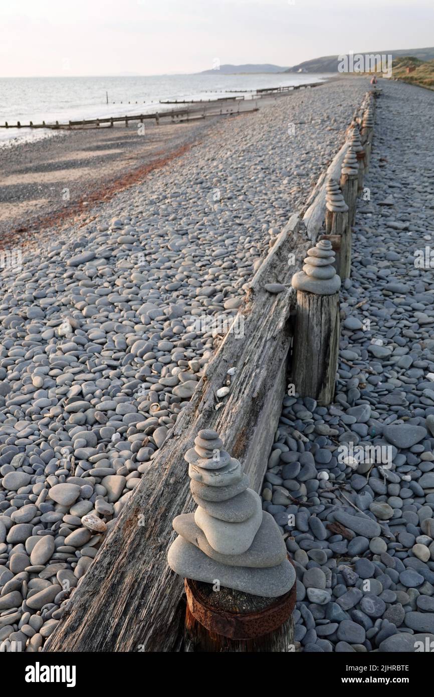 Pebble sculptures Borth beach Stock Photo - Alamy