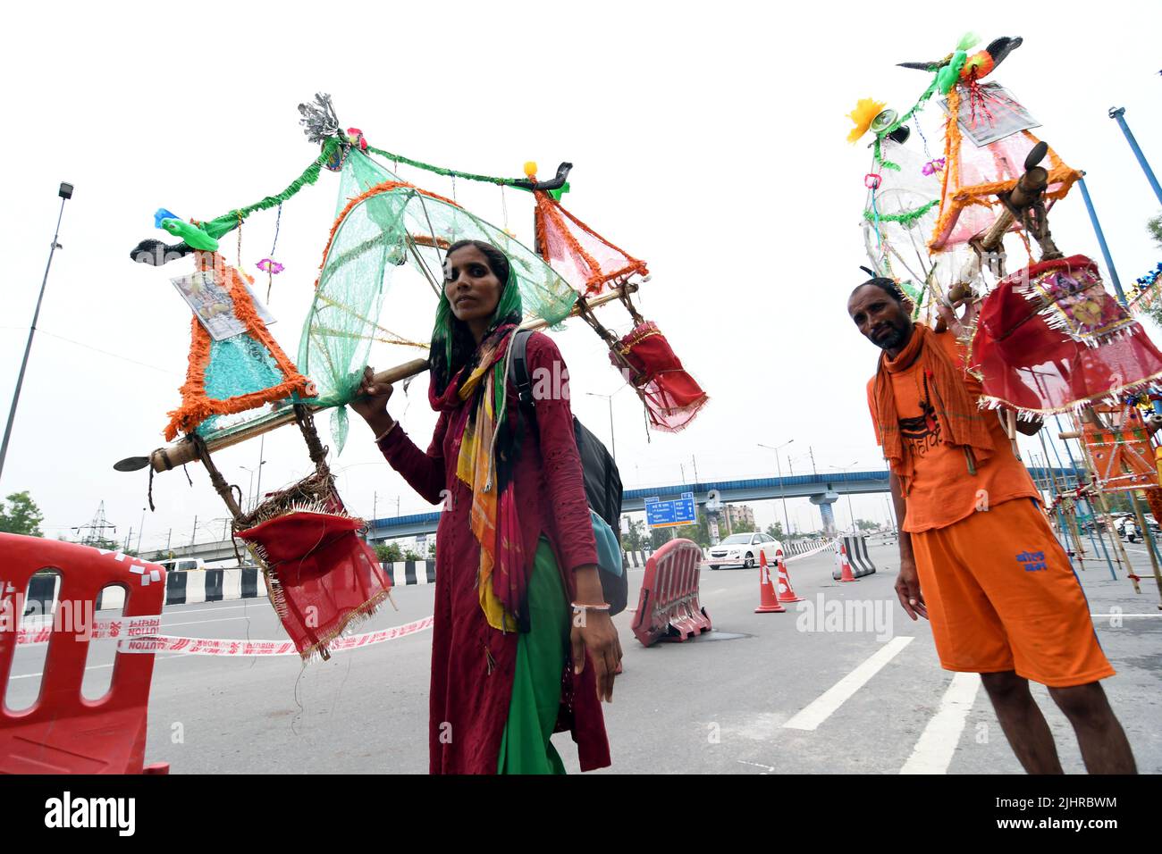 Delhi, Delhi, India. 20th July, 2022. Female Kawariya carry water kawad ...