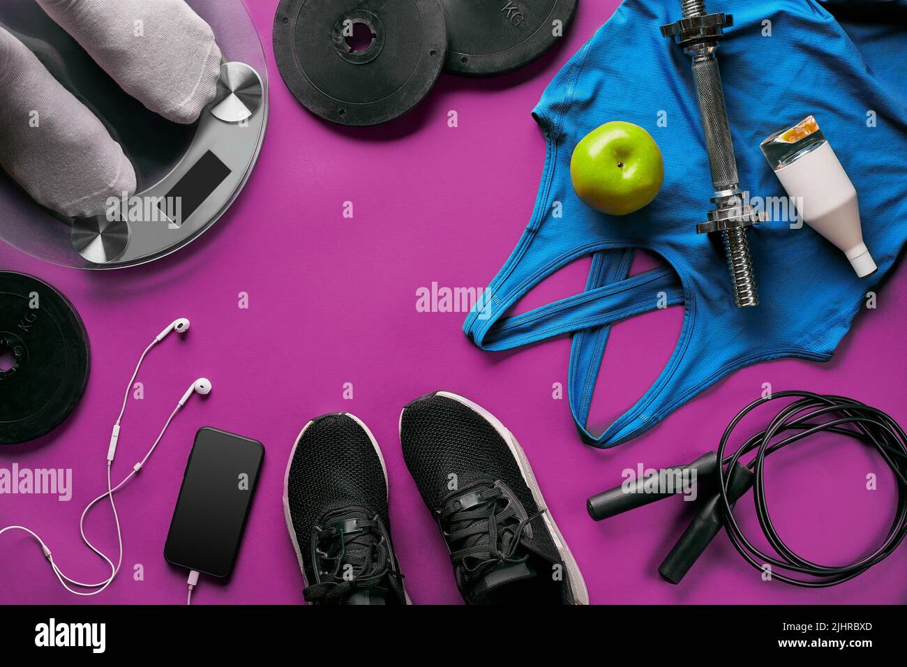 Fitness female outfit background top view. Set of sport clothing and ...