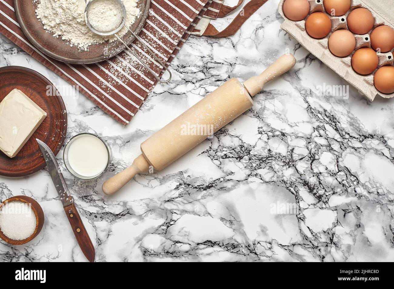 Close-up shot. Top view of a baking ingredients and kitchenware on the ...