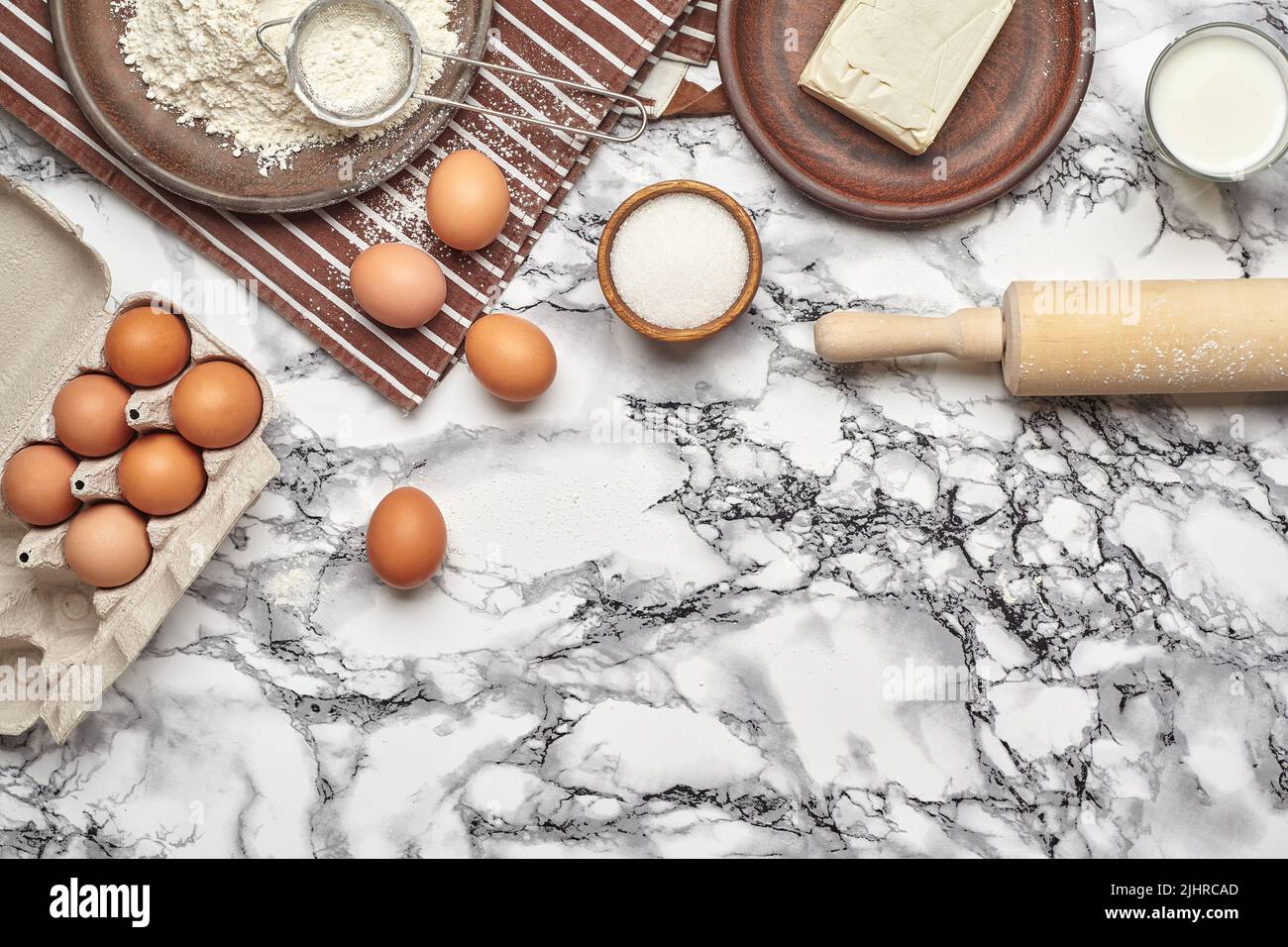 Close-up shot. Top view of a baking ingredients and kitchenware on the ...