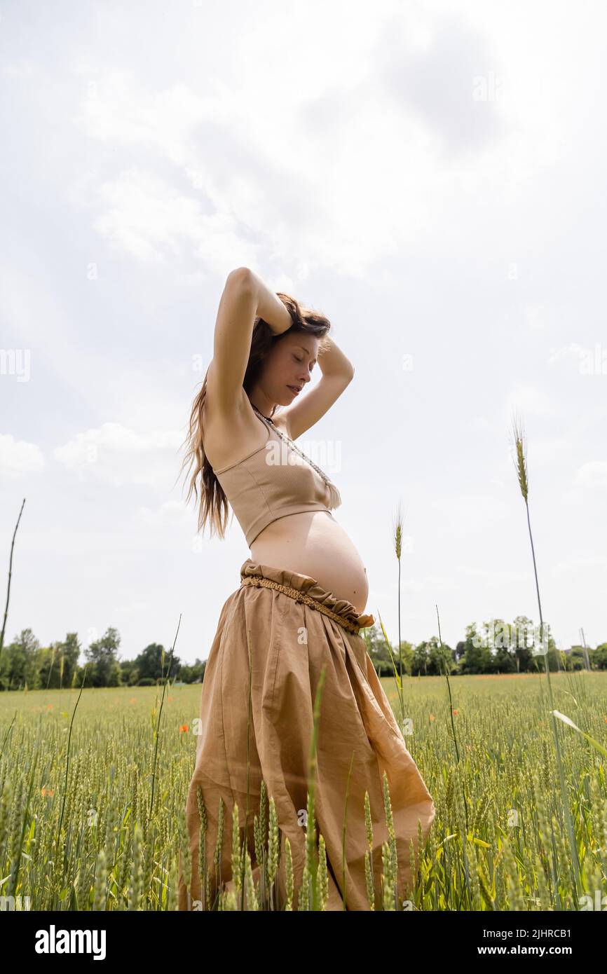 Woman belly low angle hi-res stock photography and images - Alamy