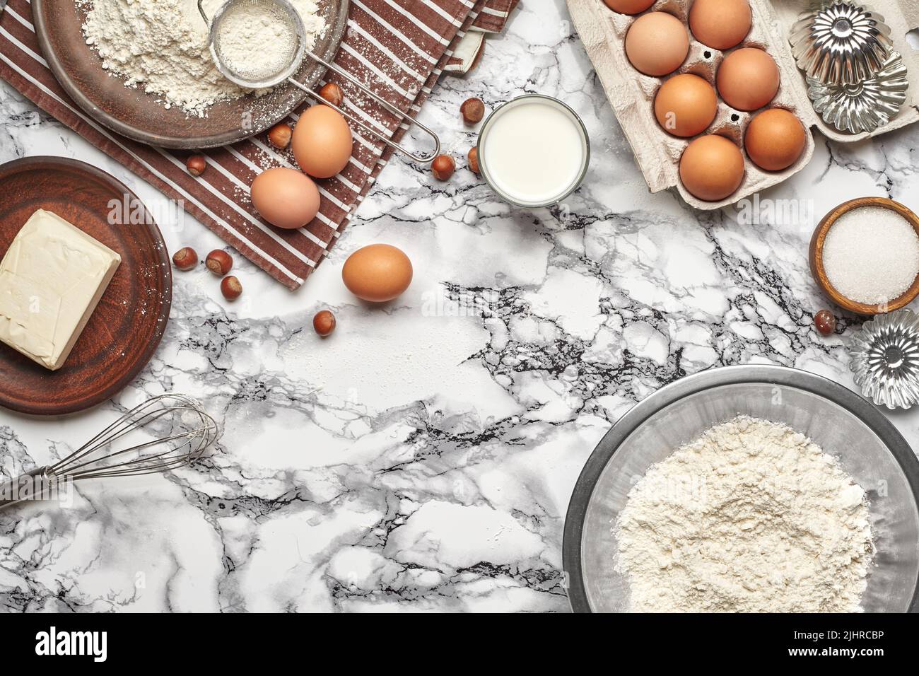 Close-up shot. Top view of a baking ingredients and kitchenware on the ...