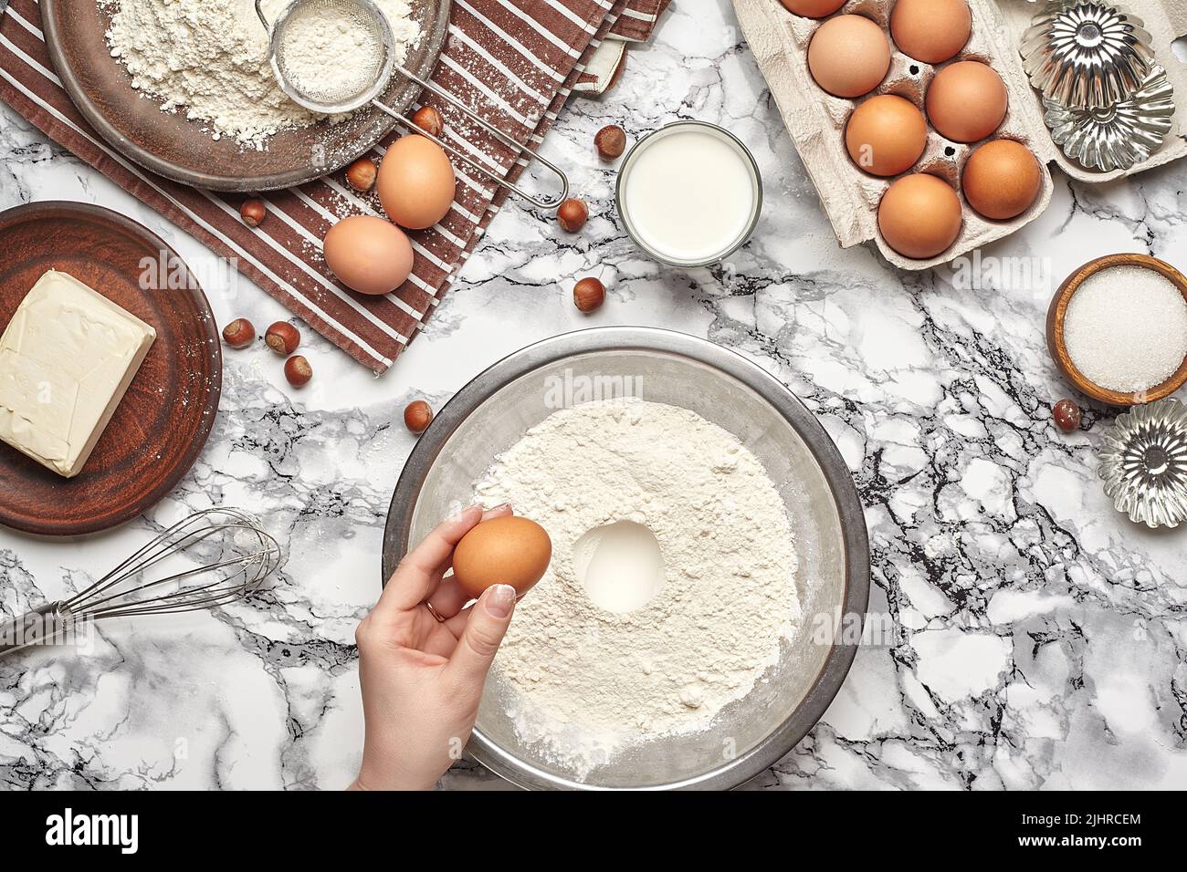 Close-up shot. Top view of a baker cook place, hands are working with a ...