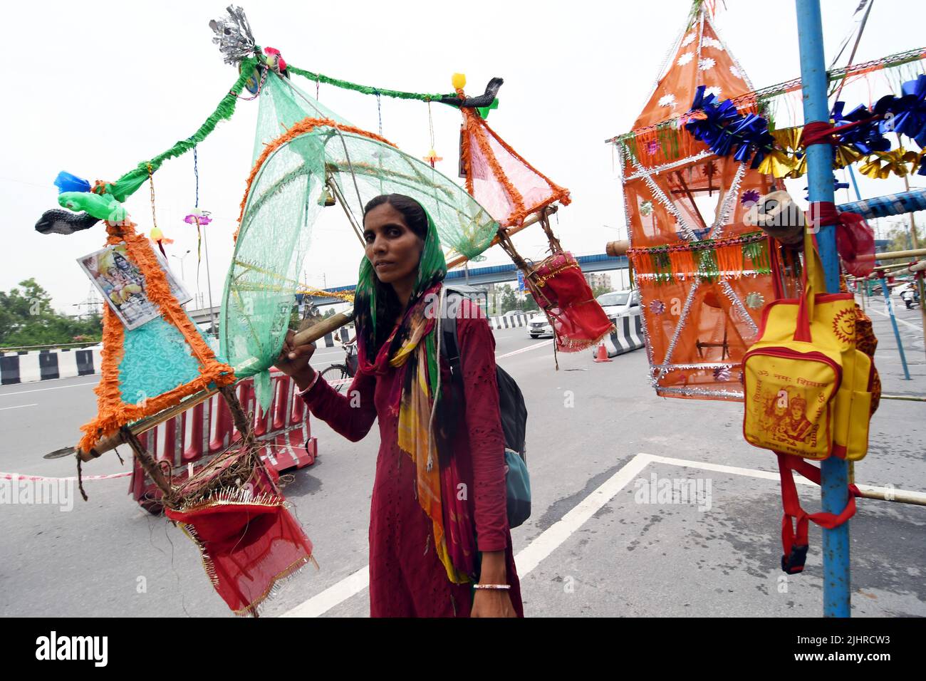 Delhi, Delhi, India. 20th July, 2022. Female Kawariya carry water kawad ...