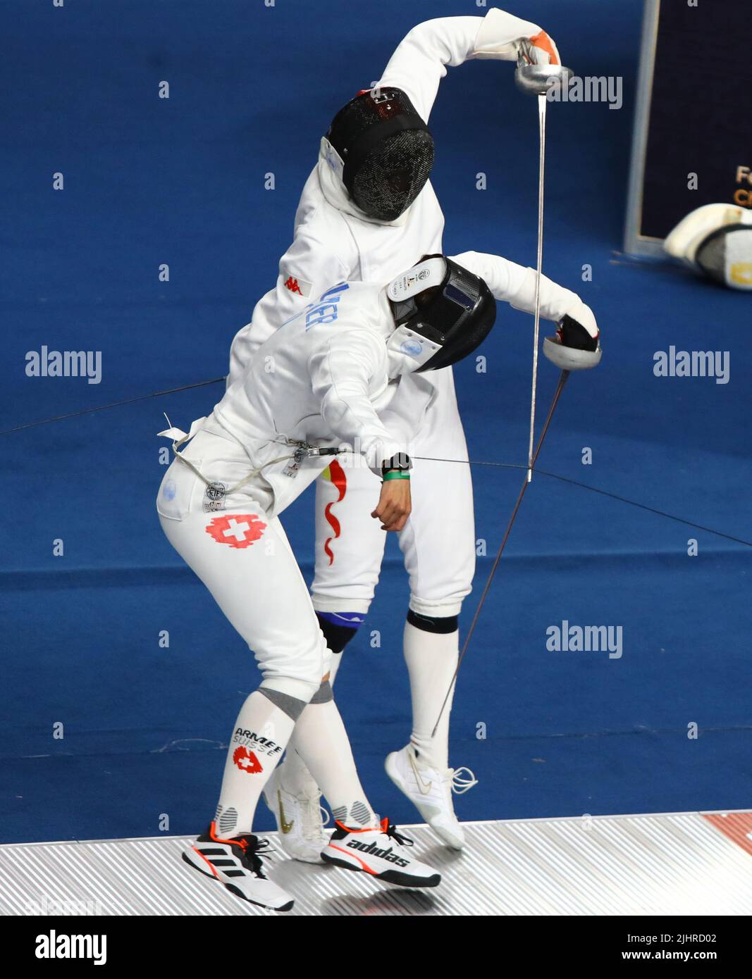 Cairo, Egypt. 20th July, 2022. Lin Sheng (R) of China competes against ...