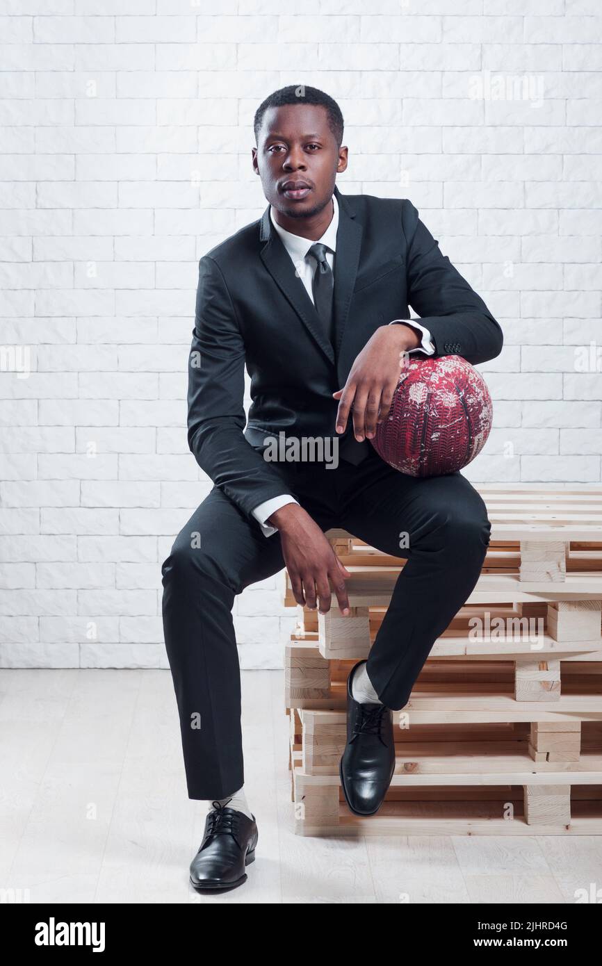 Professional sportsman posing ball american hi-res stock photography ...