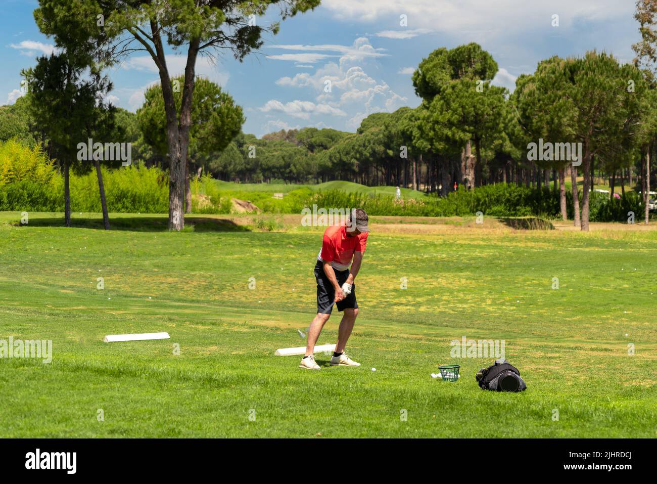 Man on golf range hi-res stock photography and images - Alamy