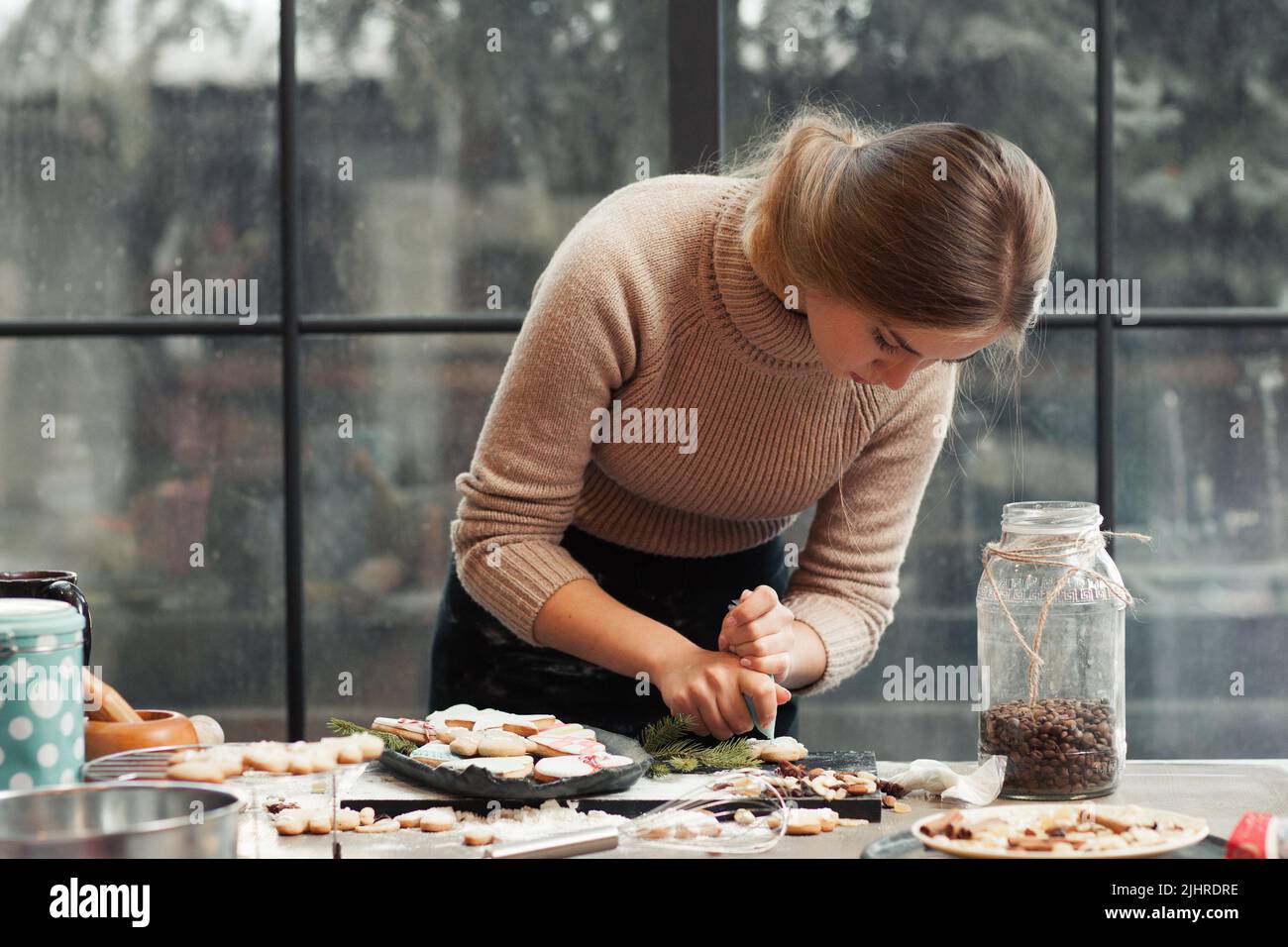 Close up human hand decorating hi-res stock photography and images - Alamy