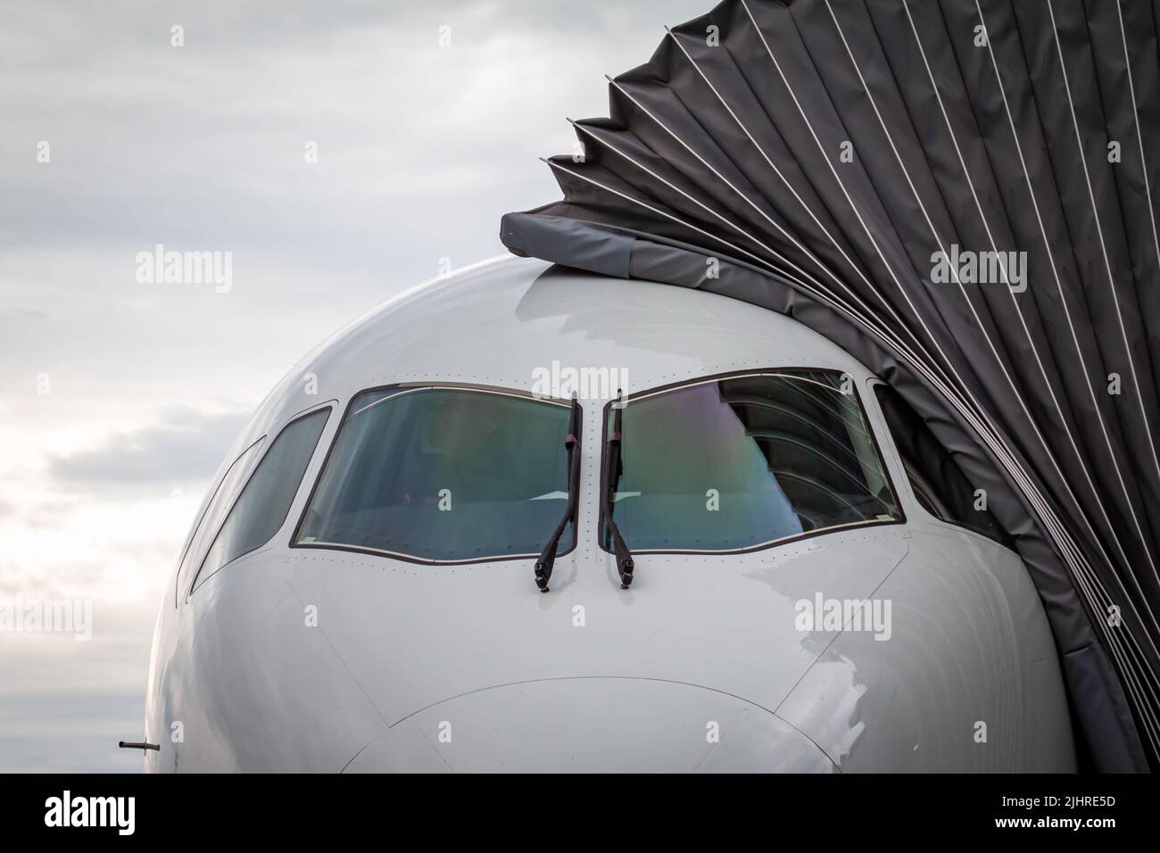 Close-up front view of the cockpit of a passenger airplane at the air ...
