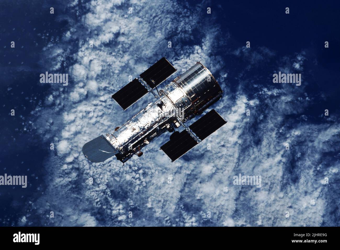 Space telescope above the earth. Elements of this image furnished by ...