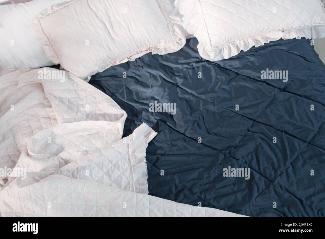 Rumpled bed after sleeping top view, free space Stock Photo - Alamy